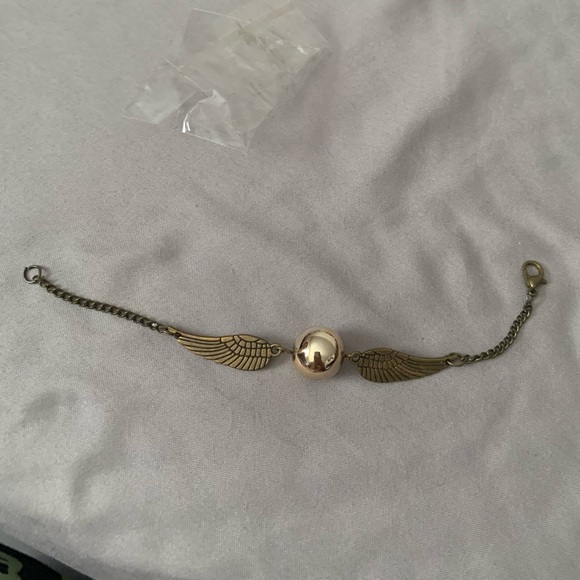 Jewelry | Nwot Harry Potter Quidditch Golden Snitch Pocket Bracelet ...